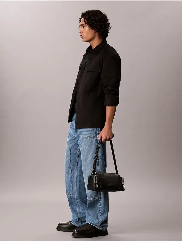 Calvin Klein Embossed Monologo Zip Flight Bag