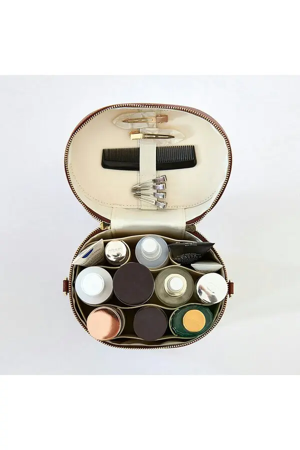 ETOILE COLLECTIVE Oval Toiletry Case In Brown