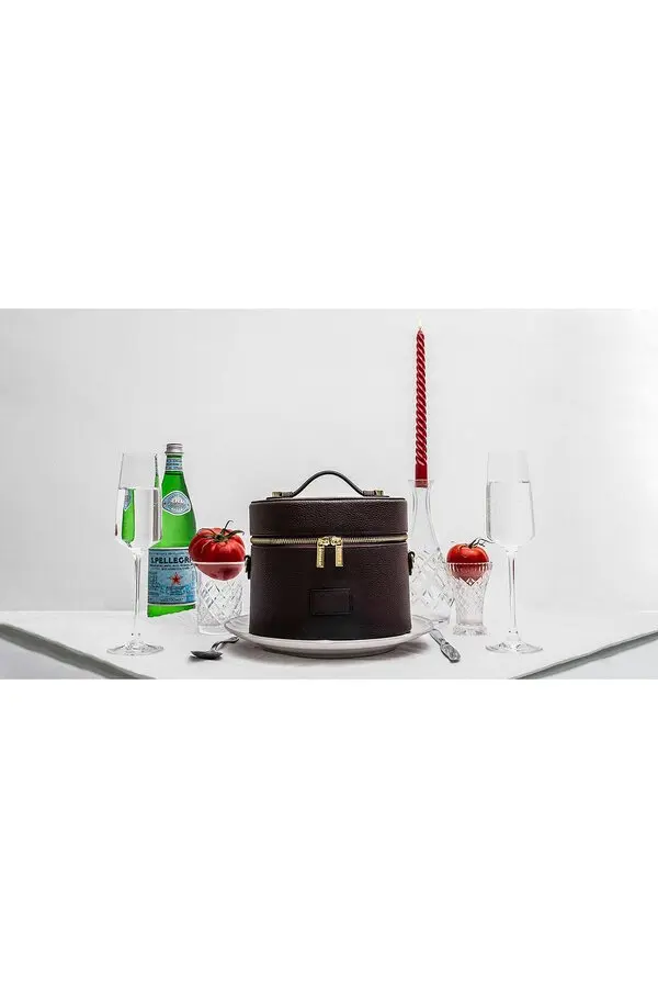 ETOILE COLLECTIVE Oval Toiletry Case In Brown