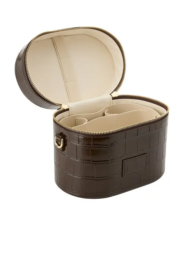 ETOILE COLLECTIVE X Revolve Oval Toiletry Case In Chocolate