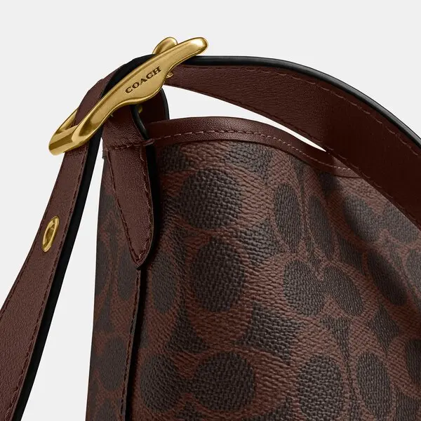 COACH OUTLET Coach Signature Canvas Bleecker Bucket Bag 21