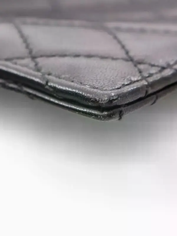 Saint Laurent Quilted Leather Clutch Bag