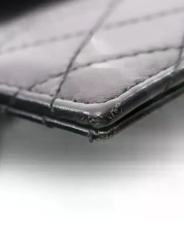 Saint Laurent Quilted Leather Clutch Bag