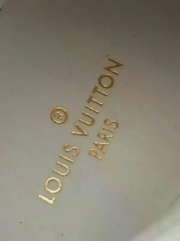 LOUIS VUITTON Quilted Leather High-top Sneakers