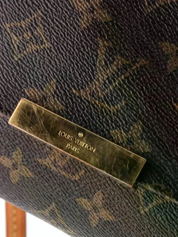 LOUIS VUITTON Monogram Canvas Favorite Pm Clutch Bag - Brown
