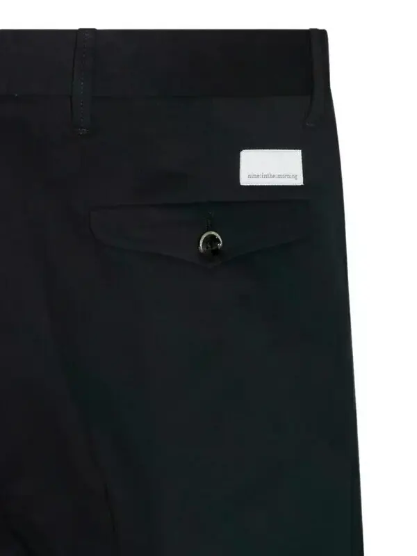 NINE:INTHE:MORNING Pleated Tapered-leg Trousers