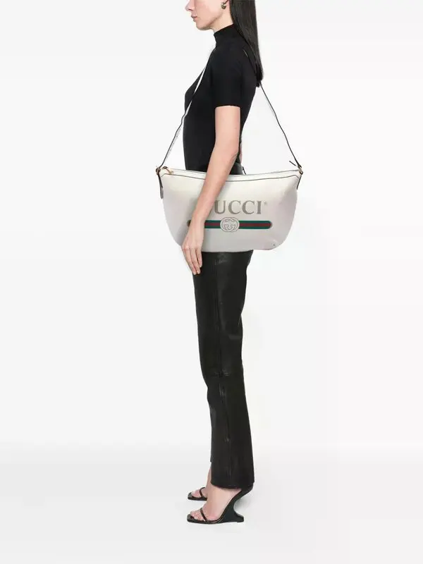 Gucci Grained Calfskin Logo Half Moon Cross Body Bag