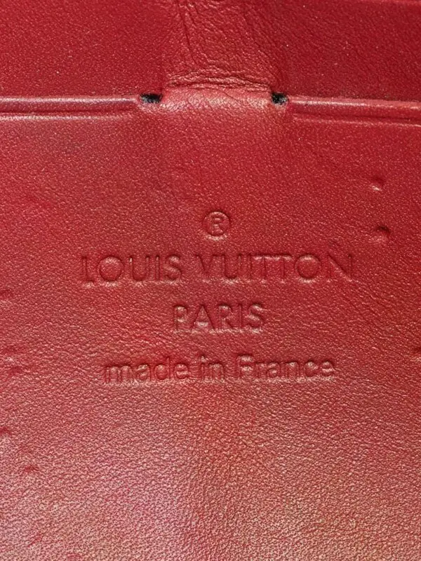 LOUIS VUITTON 2009 Le Favori Suhali Leather Wallet