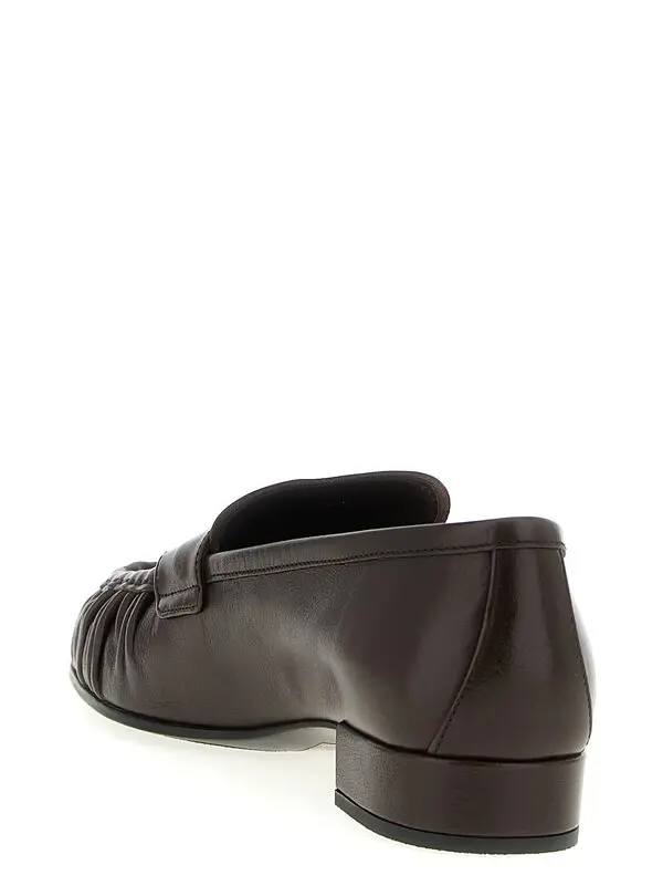 Prada Curled Toe Moccasins