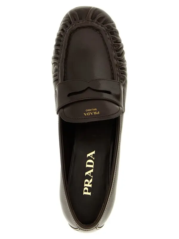 Prada Curled Toe Moccasins