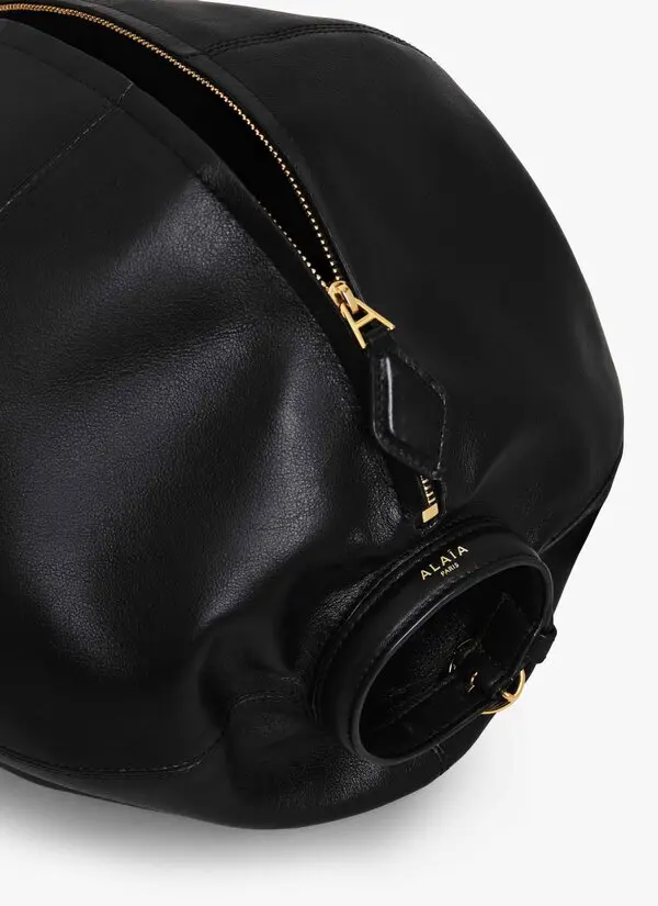 Alaïa Paneled Polished Leather Clutch - Black