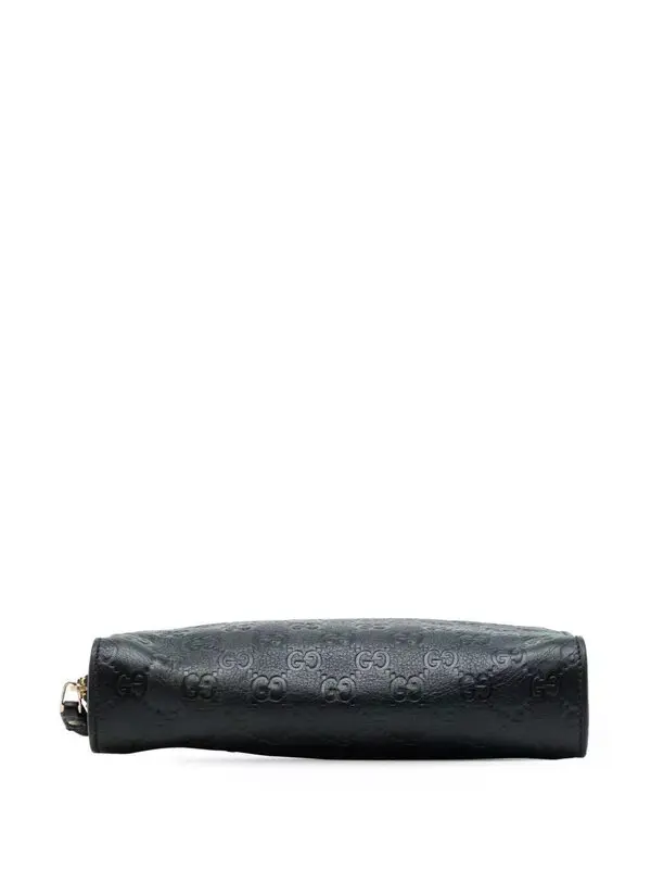 Gucci Monogram Embossed Leather Clutch Bag
