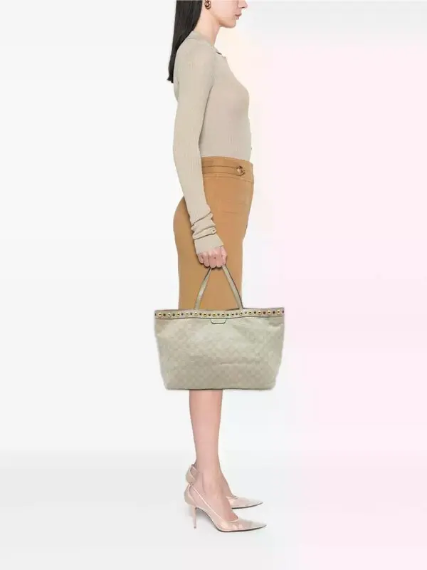 Gucci Monogram Embossed Leather Tote Bag