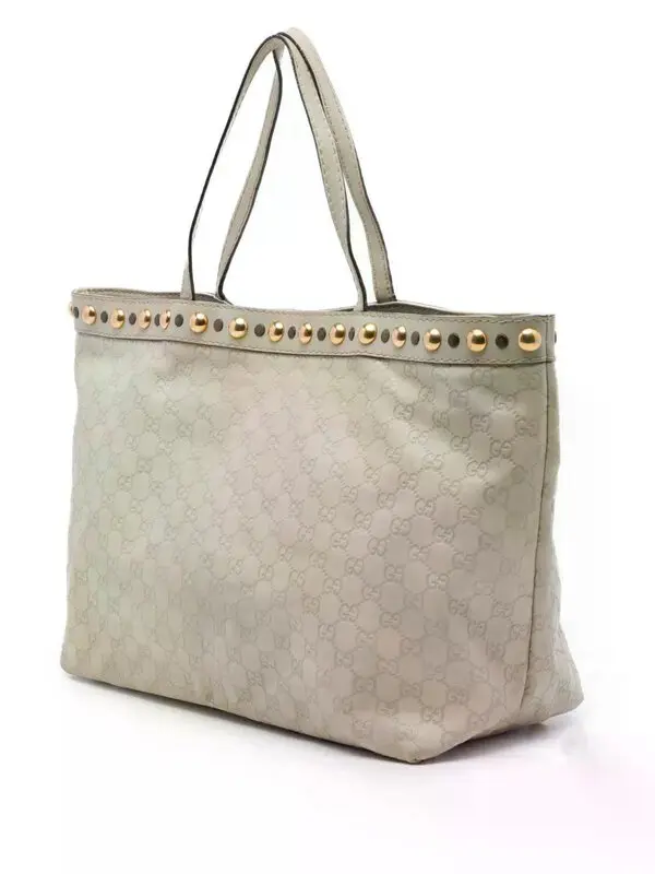 Gucci Monogram Embossed Leather Tote Bag