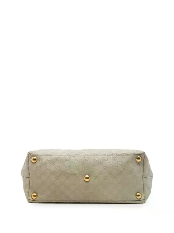 Gucci Monogram Embossed Leather Tote Bag