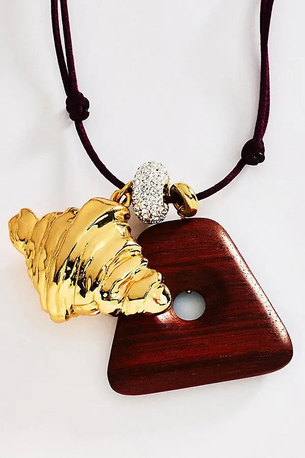 Timeless Pearly Corded Croissant Necklace
