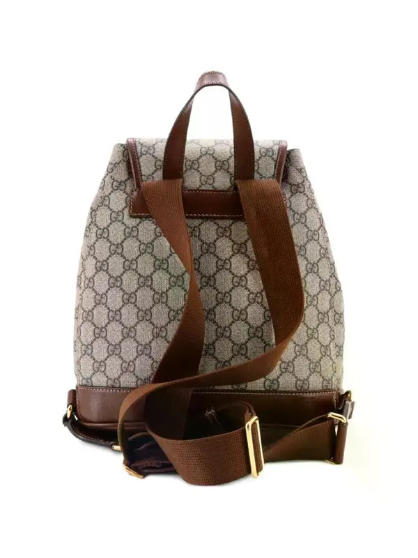 Gucci Interlocking G Patch Drawstring Flap Gg Coated Canvas Backpack - Brown