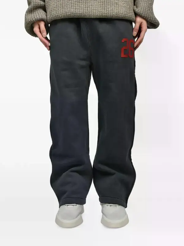 ESSENTIALS Logo-print Tearaway Trousers