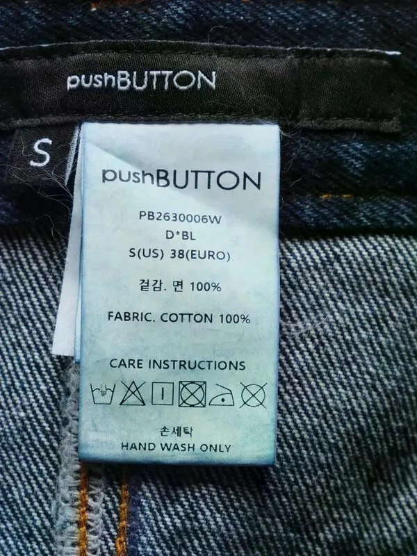 PUSHBUTTON Asymmetric-front Denim Mini Skirt