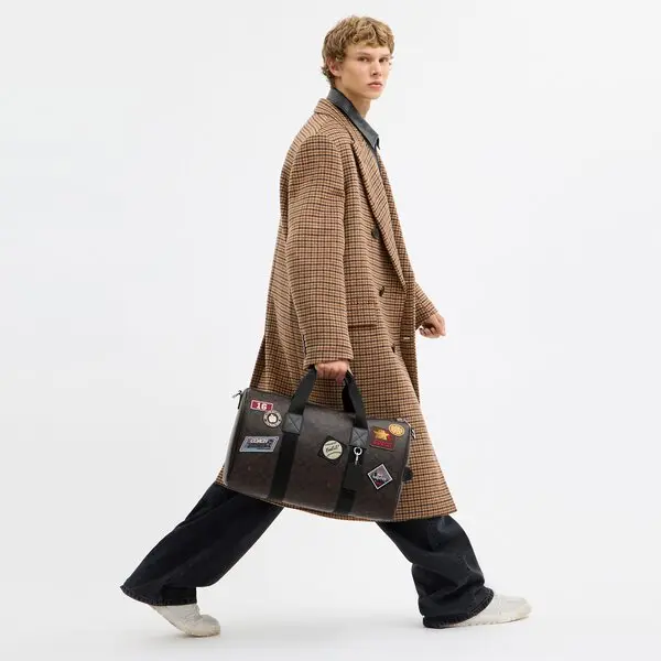 COACH OUTLET Explorer Duffle Bag 45 In Signature Canvas With Patches