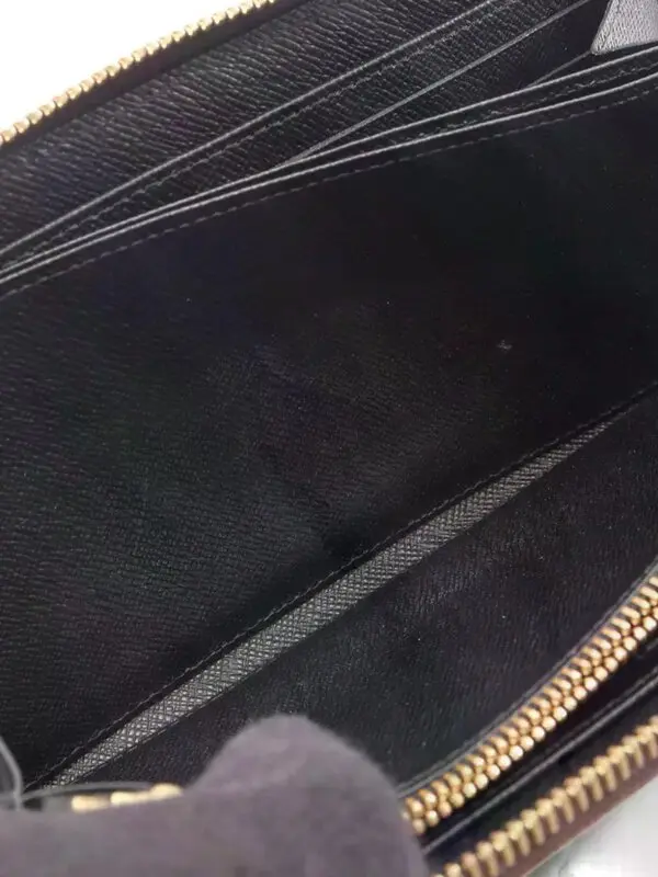 LOUIS VUITTON 2021s Zippy Monogram Giant Reverse Wallet