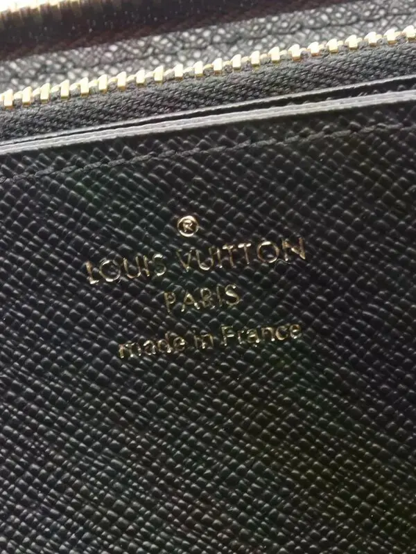LOUIS VUITTON 2021s Zippy Monogram Giant Reverse Wallet - Brown