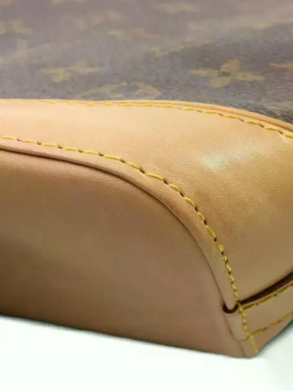 LOUIS VUITTON 2006 Lockit Monogram Handbag