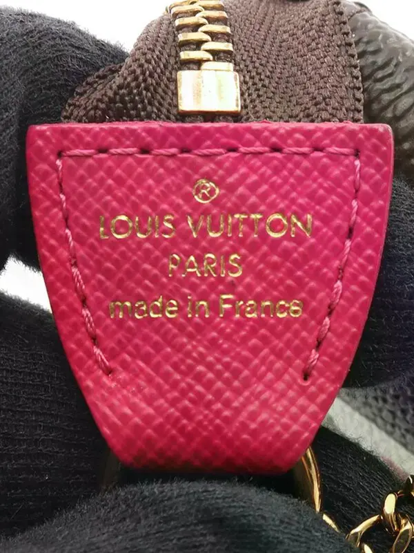 LOUIS VUITTON Monogram Christmas Animation Mini Pochette Handbag - Brown