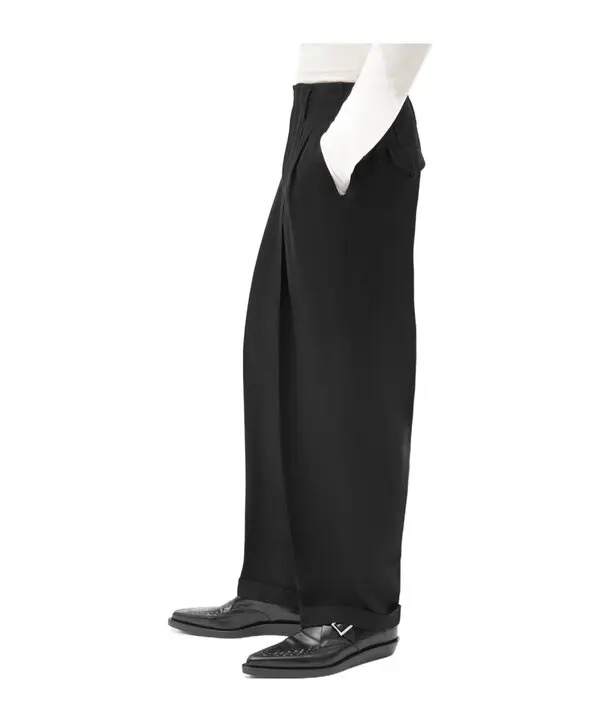 ANN DEMEULEMEESTER Agdar Pleated Tapered Trousers