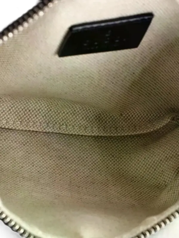 Gucci Gg Embossed Perforated Leather Small Belt Bag