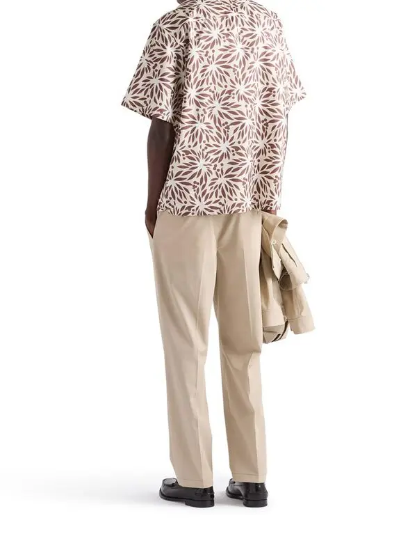 Prada Cotton Trousers With Enameled Metal Triangle Logo