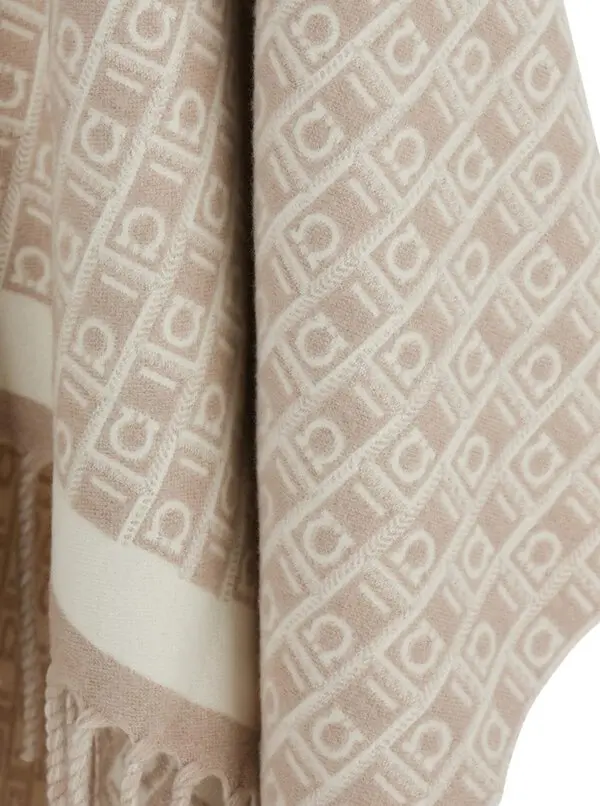 FERRAGAMO Beige Cape With Frayed Hem And All-over Gancini Embroidery In Wool For - Multicolor