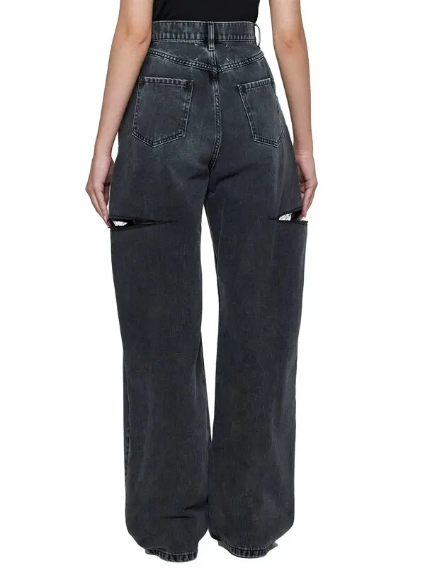 MAISON MARGIELA Black 'cut' Jeans By