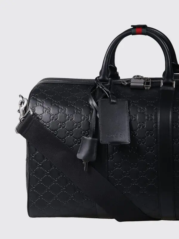 Gucci Gg Emblem Leather Duffle Bag With Embossed Gg Monogram
