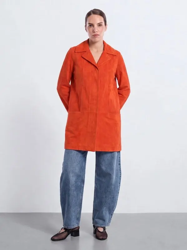 Alaïa Curved Denim Jeans