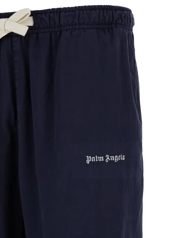 Palm Angels Blue Flared Trousers In Cotton