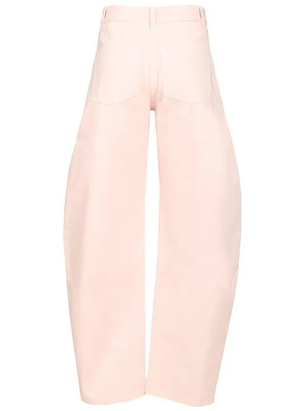 Alaïa Curved Dyed Denim Jeans