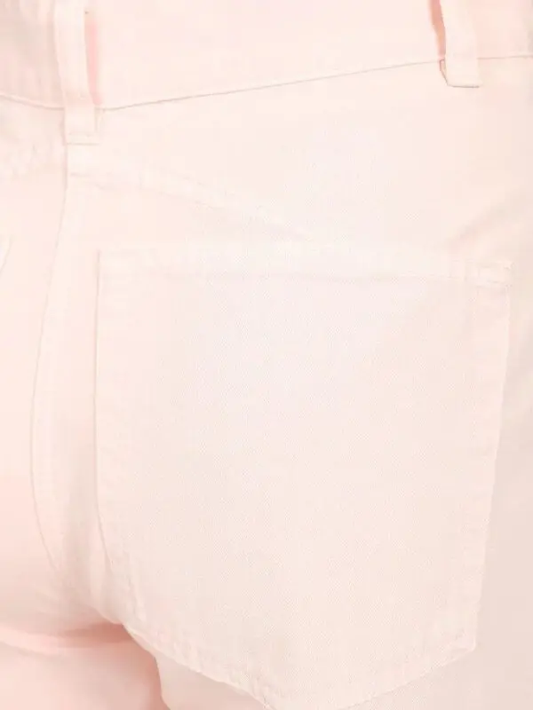 Alaïa Curved Dyed Denim Jeans