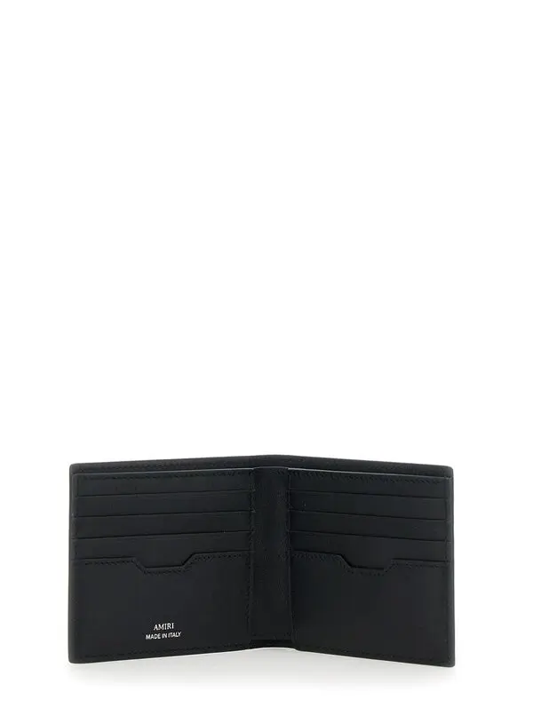 Amiri Bi-fold Wallwt With Logo Lettering On The Front In Leather
