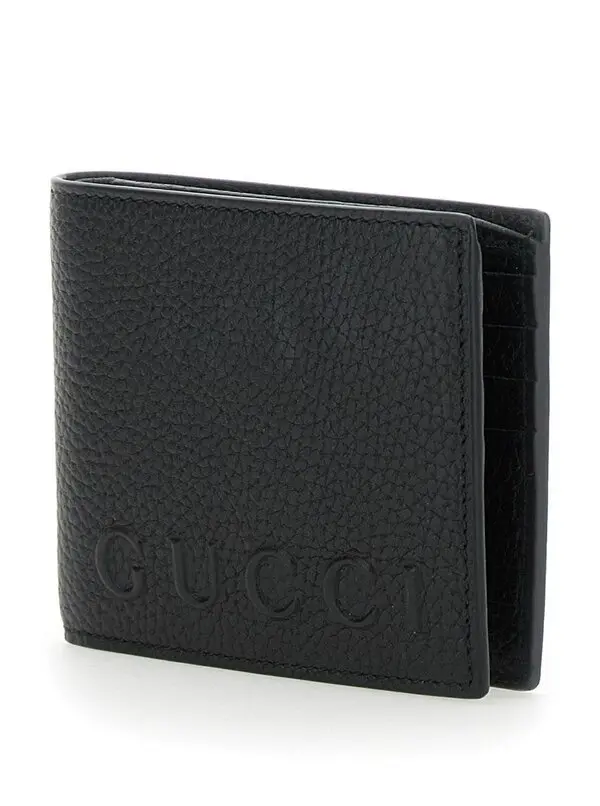 Gucci Black Bi-fold Wallet With Embossed Logo Lettering On The Front In Grained Leather