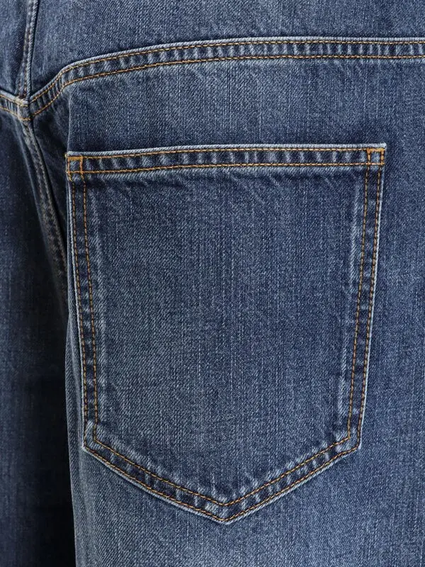 Givenchy Twisted Stone-washed Denim Jeans
