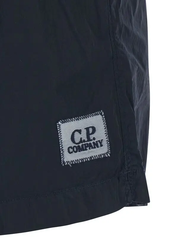 C.P. COMPANY Blue Swim Shorts With Logo On The Front In Tech Fabric