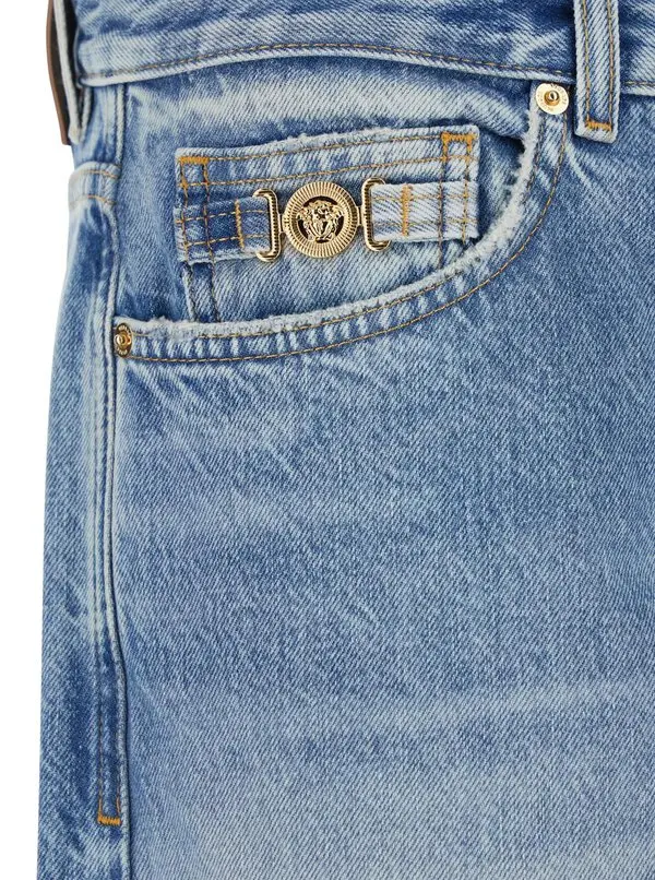 Versace Light Blue Jeans With Logo Patch On The Back And Faded Effect In Denim For