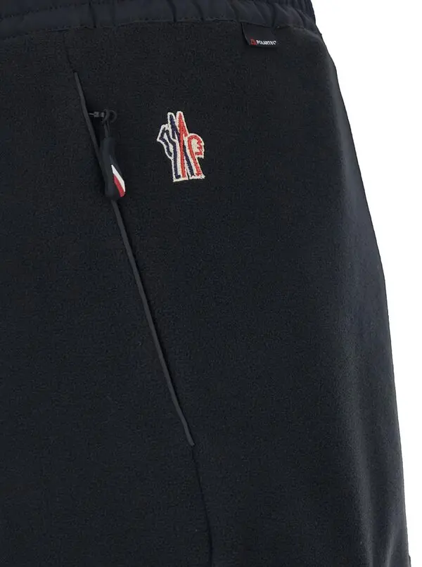 Moncler Black Pants With Side Logo Patch And Tech Fabric Inserts In Fleece