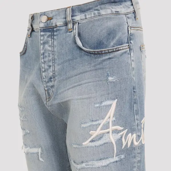 Amiri Repaired Slim Jeans
