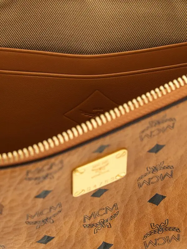 Mcm Aren Monogram Canvas Clutch - Brown
