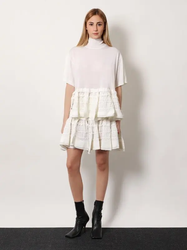 Alaïa Virgin Wool Peplum Sweater