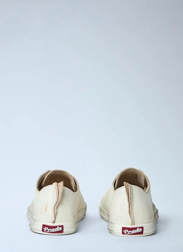Prada Antiqued Leather Sneakers - White