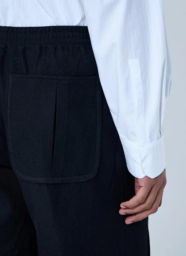 KIKO KOSTADINOV High-waisted Pleated Trousers