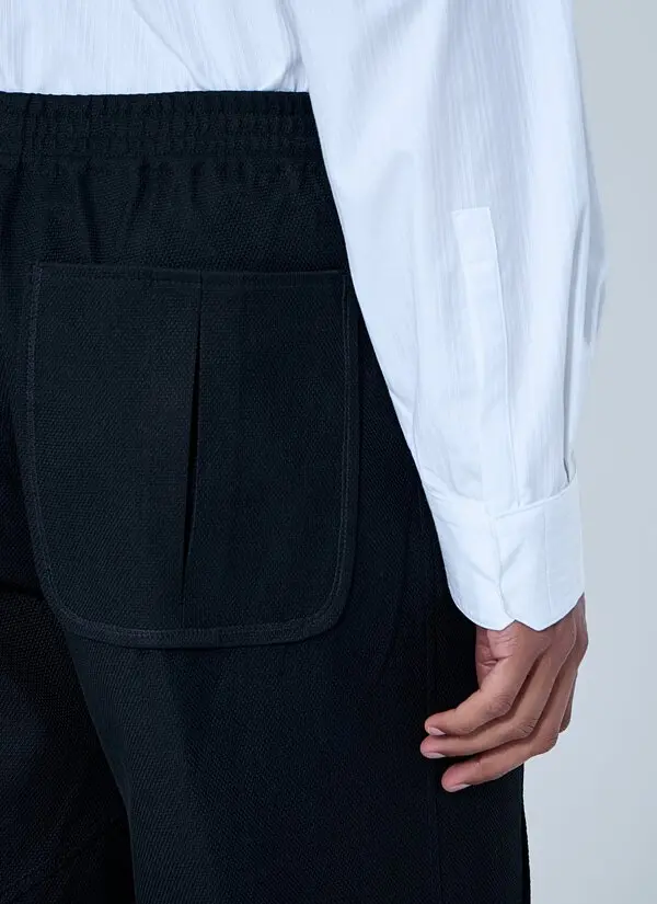 KIKO KOSTADINOV High-waisted Pleated Trousers